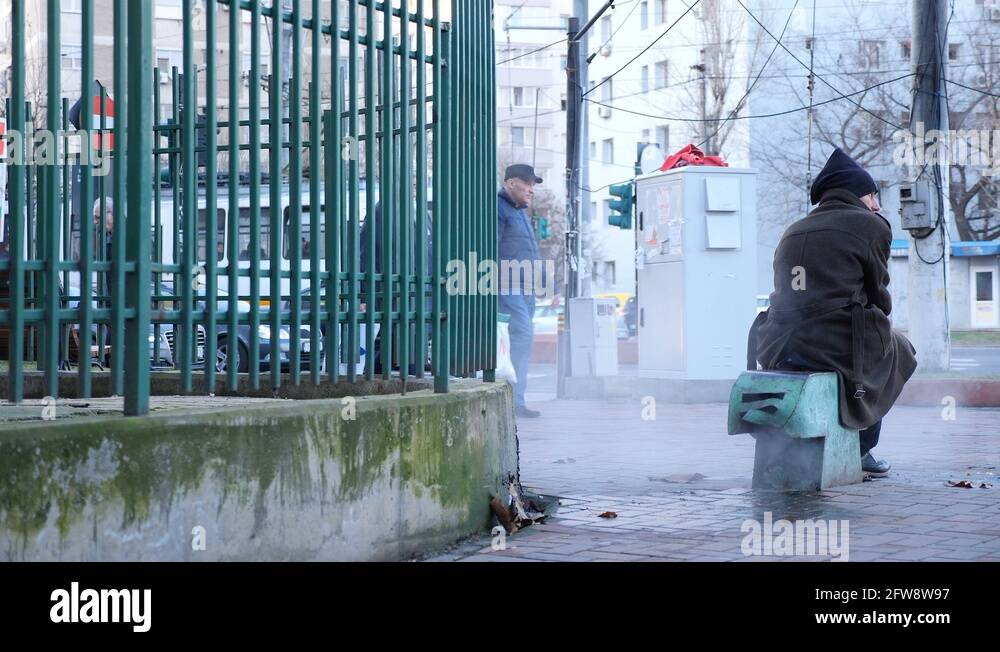 Homeless person sitting on the street Stock Videos & Footage - HD and ...