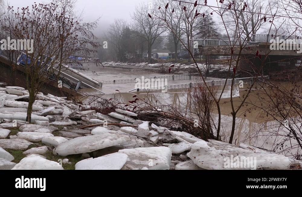 Bridge collapses into river during severe storm and flash flooding ...