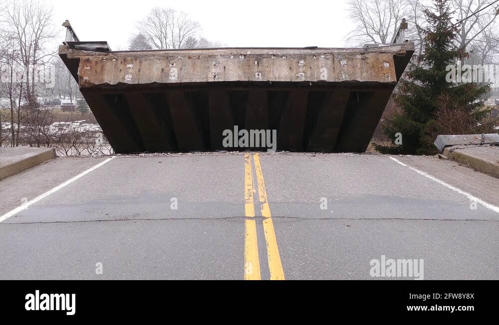 Bridge collapses into river during severe storm and flash flooding ...