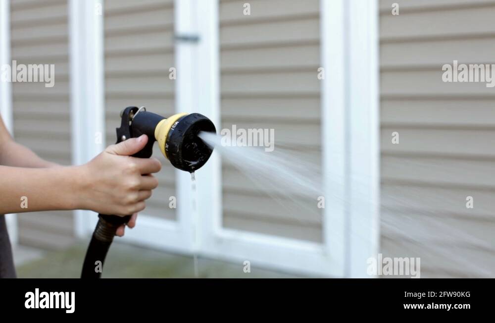 Using hose Stock Videos & Footage - HD and 4K Video Clips - Alamy