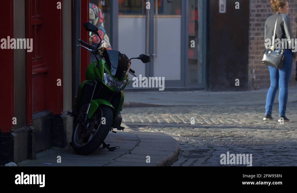 Motorcycle parked on a pavement Stock Videos & Footage - HD and 4K ...