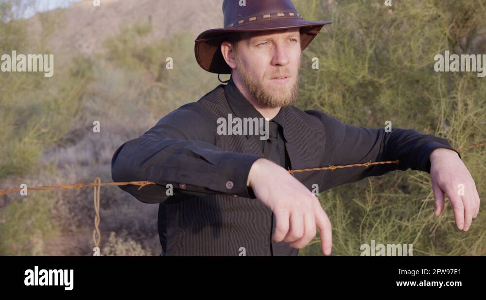 Cowboy leaning on fence Stock Videos & Footage - HD and 4K Video Clips ...