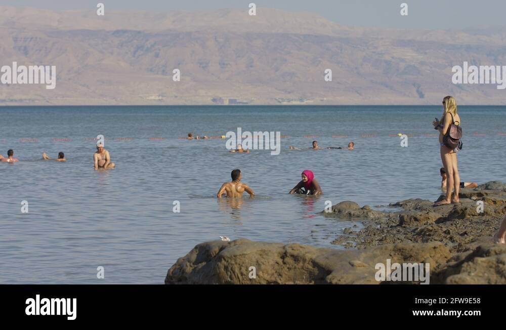 Bathing in dead sea Stock Videos & Footage - HD and 4K Video Clips - Alamy