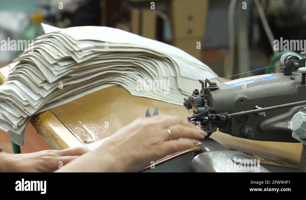 Tailor sews Stock Videos & Footage - HD and 4K Video Clips - Alamy