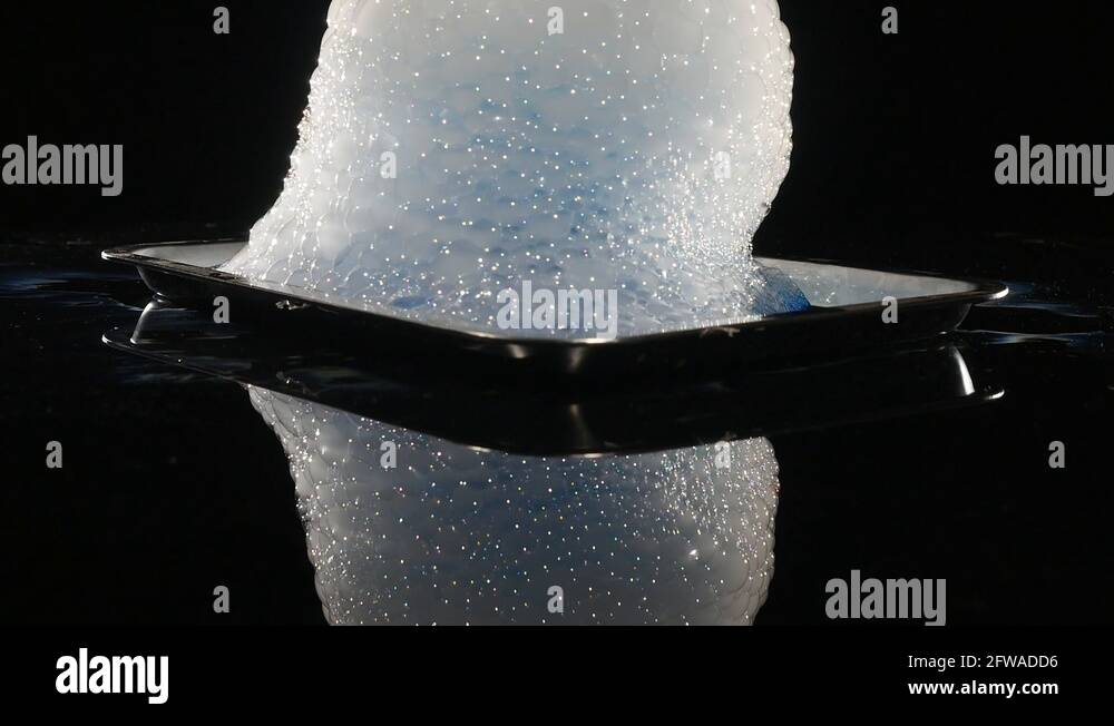 Foam with steam made of dry ice Stock Video Footage - Alamy