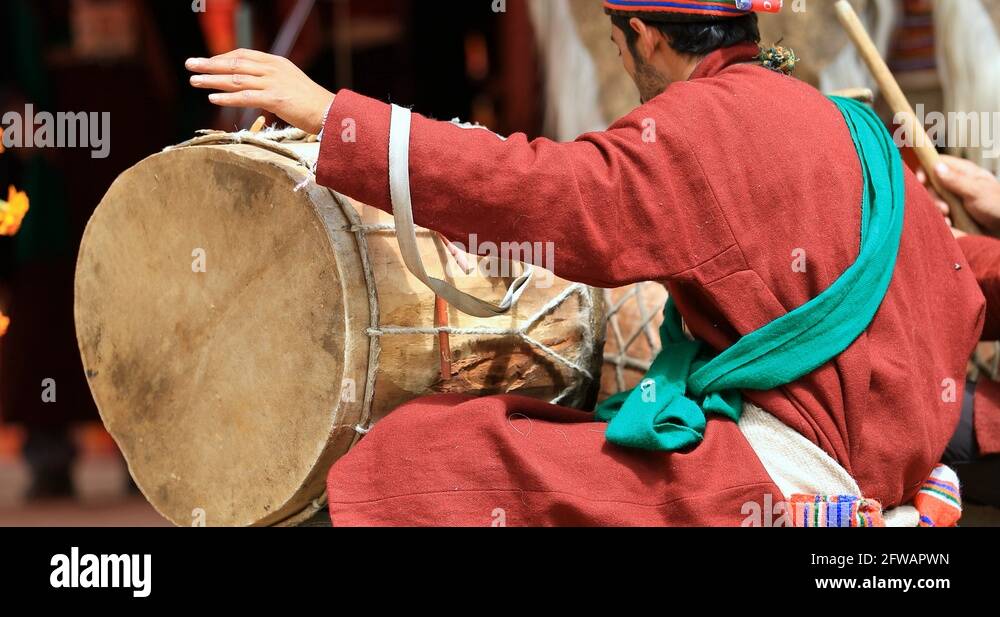 Ethnic musician plays traditional Ladakh drum music rhythm at festival ...