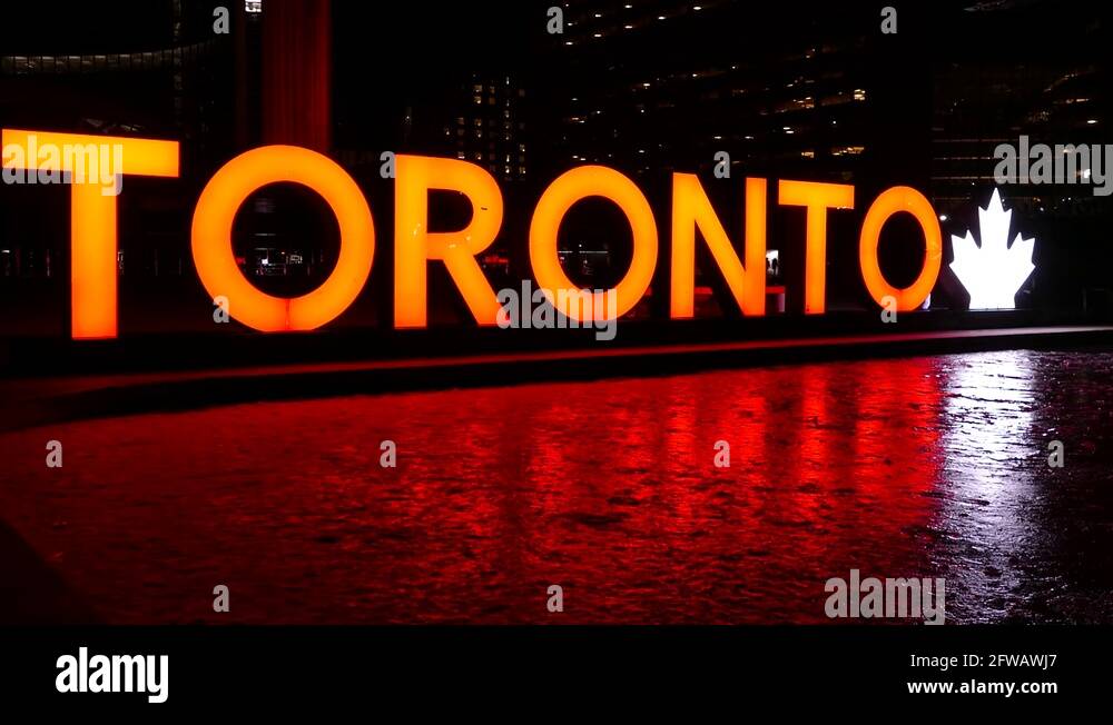 City of Toronto sign in full color at night Stock Video Footage - Alamy