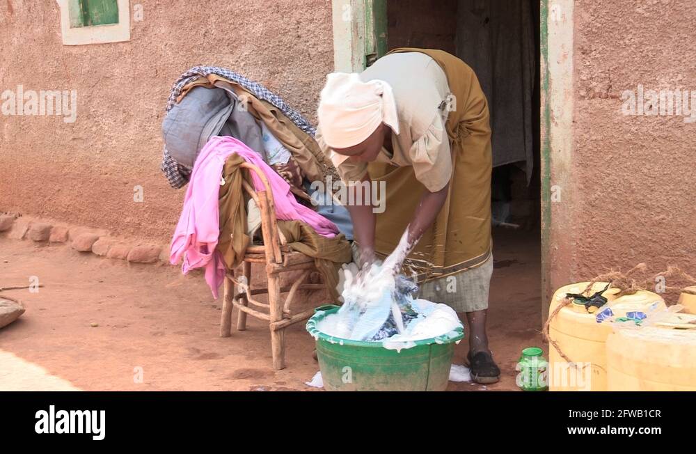 Kenya woman washing clothes in Stock Videos & Footage - HD and 4K Video ...
