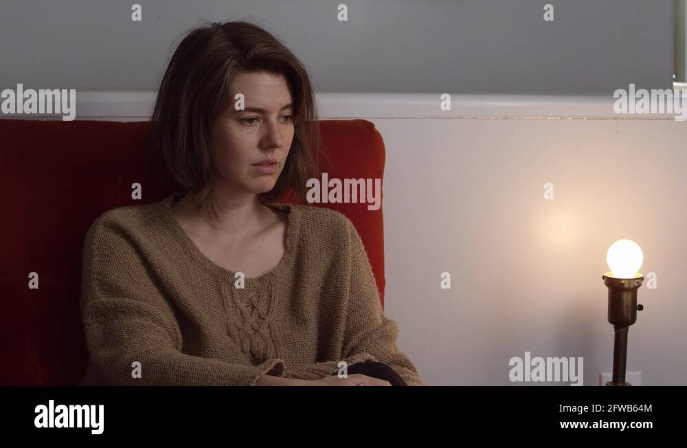 Woman get off chair Stock Videos & Footage - HD and 4K Video Clips - Alamy