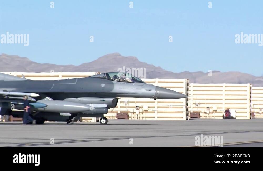 F-16 Stringer taxiing on the runway for Red Flag combat training ...
