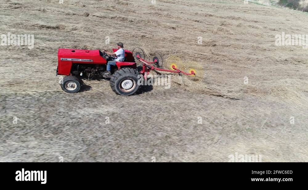 Agricultural star wheel hay rake machine Stock Videos & Footage - HD ...