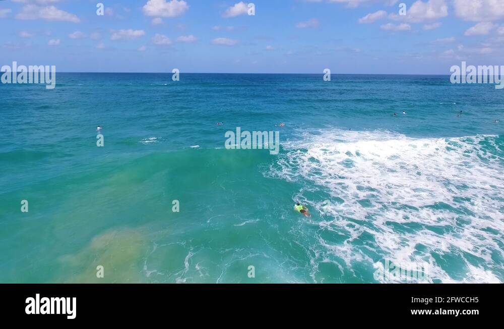 Surfers catching waves aerial Stock Videos & Footage - HD and 4K Video ...