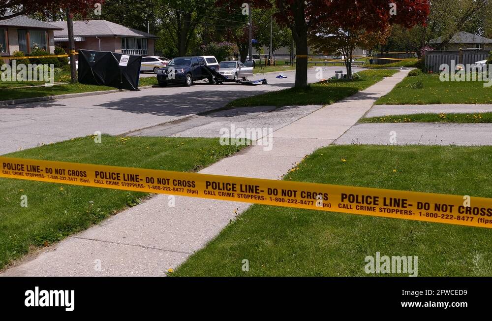 Police homicide officers at shooting murder scene Stock Video Footage ...