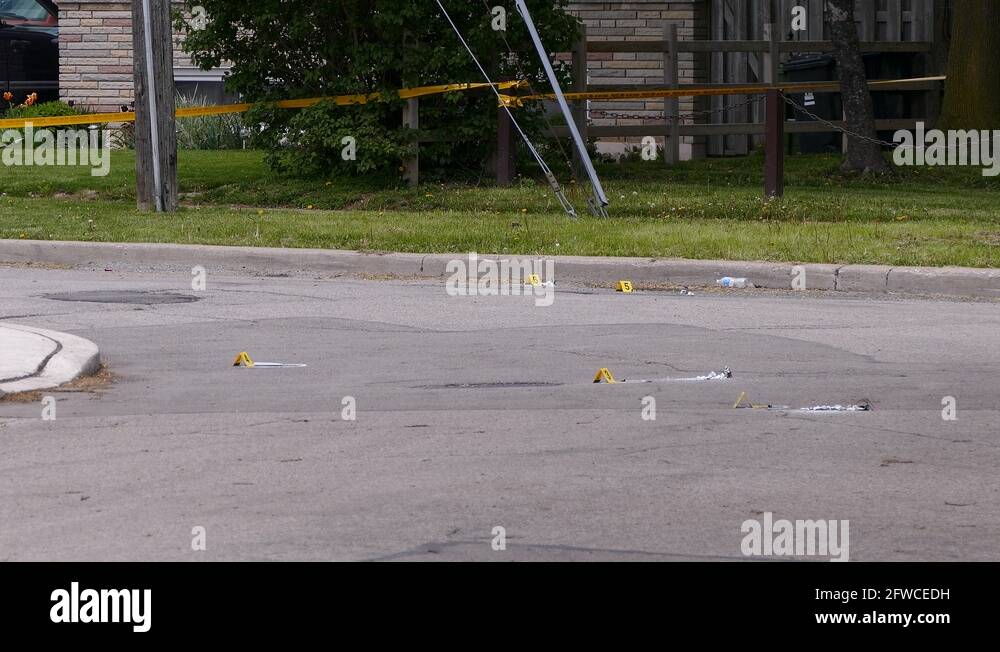 Police homicide officers at shooting murder scene Stock Video Footage ...