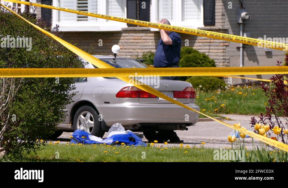 Police homicide officers at shooting murder scene Stock Video Footage ...