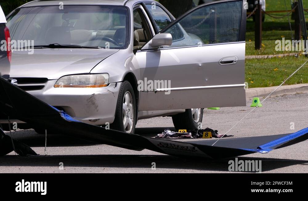 Police homicide officers at shooting murder scene Stock Video Footage ...