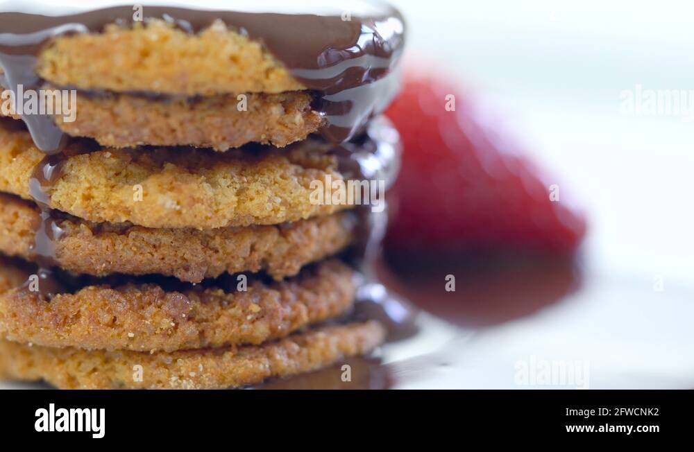 Chocolate syrup dripping over stack Stock Videos & Footage - HD and 4K ...