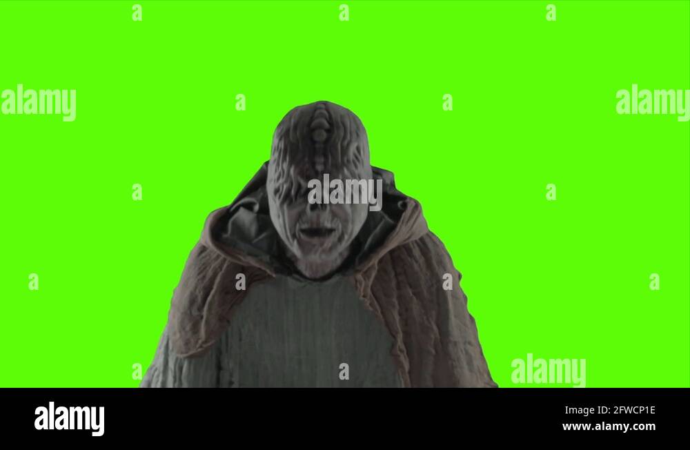 A scary monster with a green screen background Stock Video Footage - Alamy
