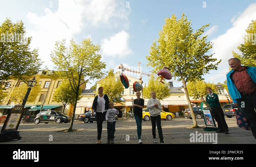 Amusement Park Excitement. A Fairground With Carnival Rides And Happy ...