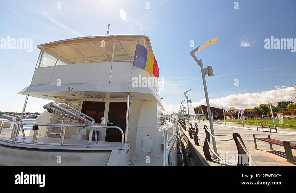 Marina Pier and Stern of a Catamaran Stock Video Footage - Alamy
