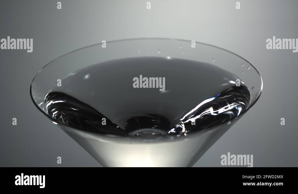 Water drop on water surface longdrink. Ultra slow motion hispeed ...