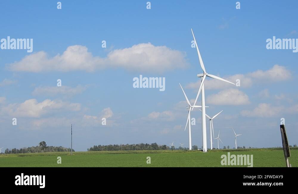Wind Energy Farms With Street Signs Stock Video Footage - Alamy