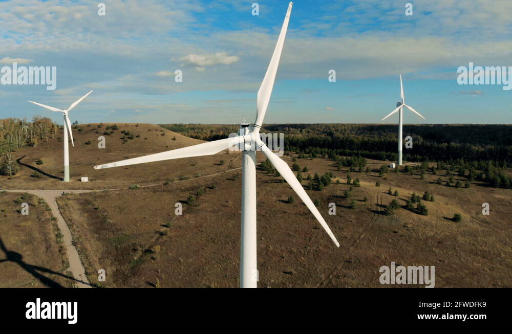 Big windmills generating electricity. Green energy, renewable energy ...