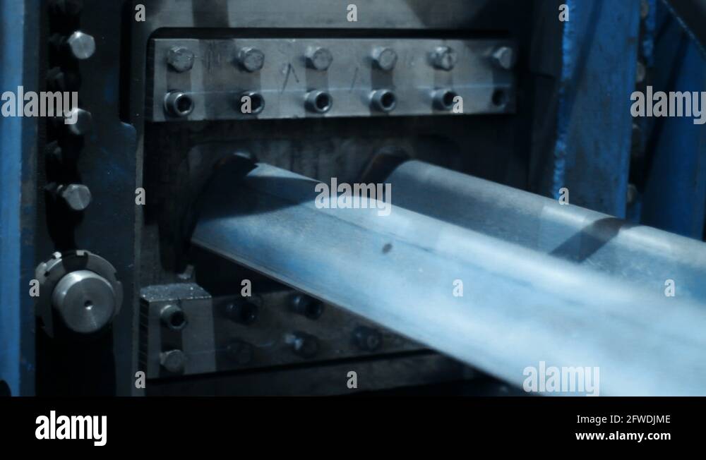 Cold rolled steel profile with zinc coating and holes. Industrial ...