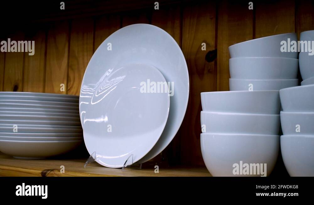 Stacked white dishes Stock Videos & Footage - HD and 4K Video Clips - Alamy