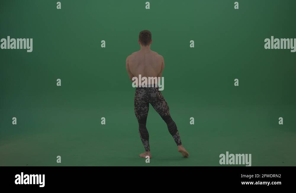 Young Athletic Bodybuilder Demonstrating ripped body On Green Screen ...