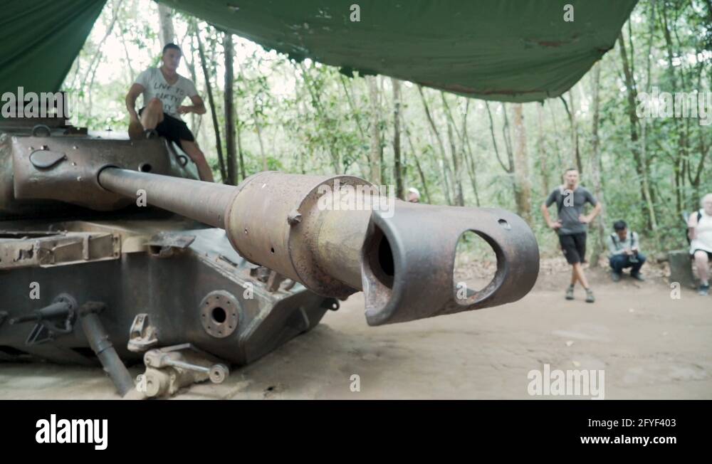 Tracking shot looking into tank gun of American M41 Walker Bulldog 76 ...