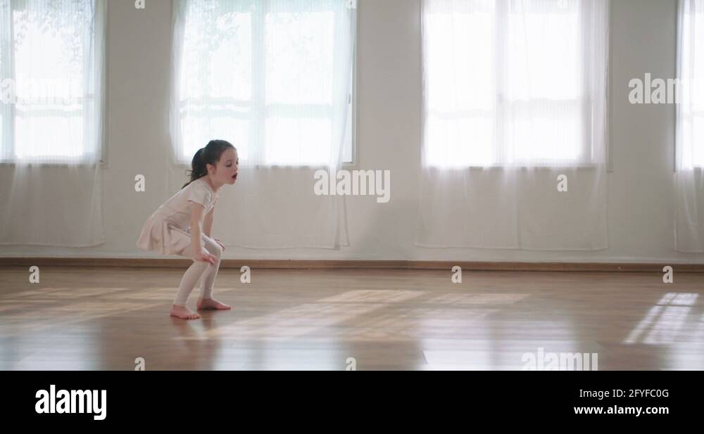 Little girl dancing alone in a studio Stock Video Footage - Alamy