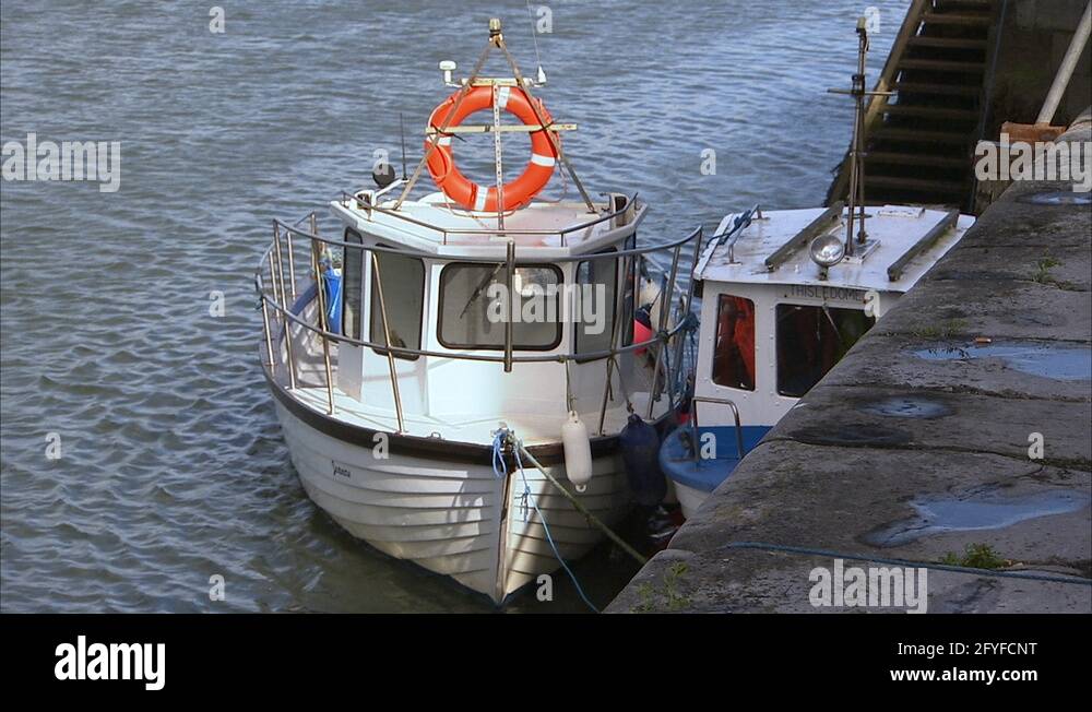 Docked small boats Stock Videos & Footage - HD and 4K Video Clips - Alamy