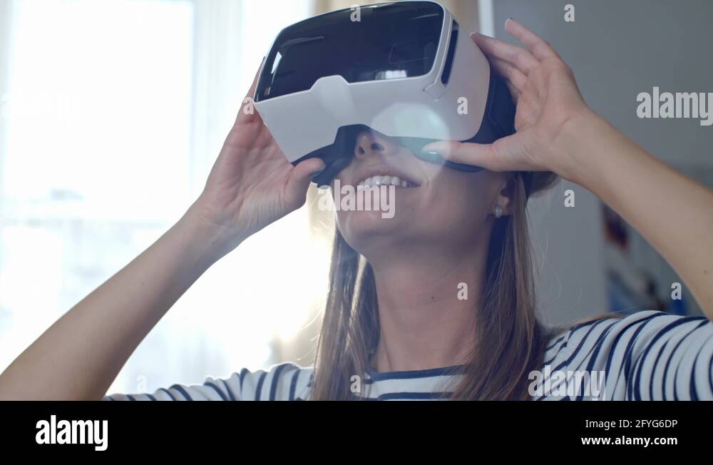 Woman in vr headset Stock Videos & Footage - HD and 4K Video Clips - Alamy