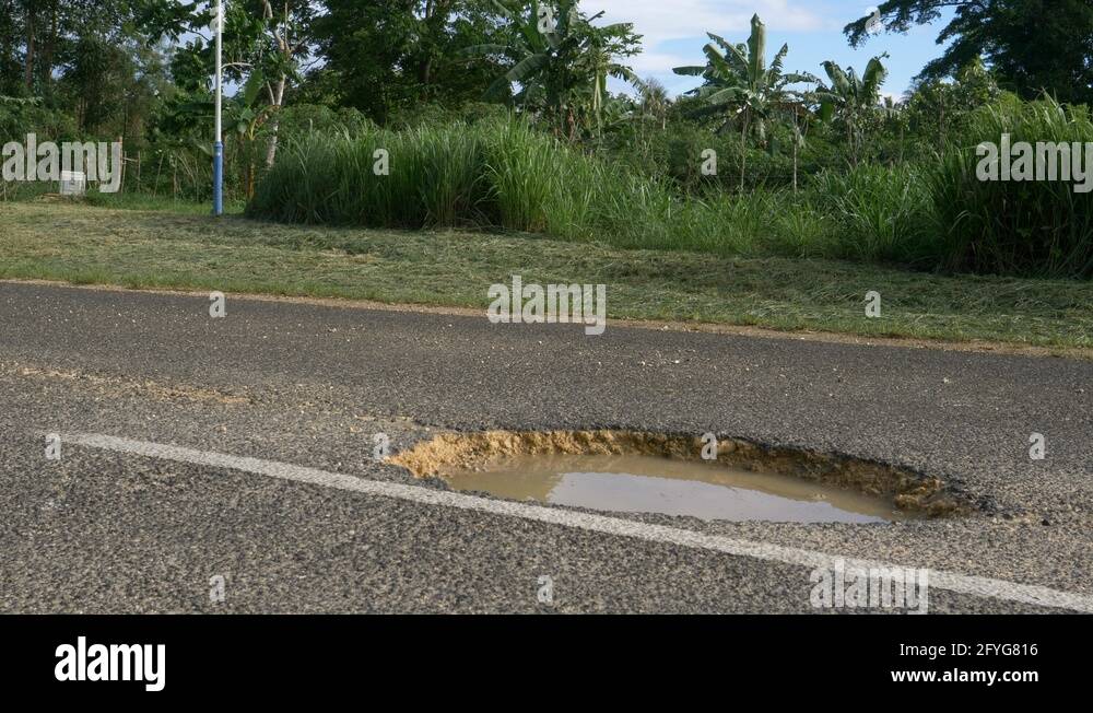 Water filled pothole Stock Videos & Footage - HD and 4K Video Clips - Alamy