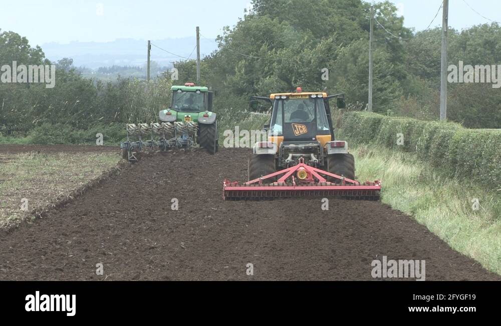 Ploughing and tilling, rear view Stock Video Footage - Alamy