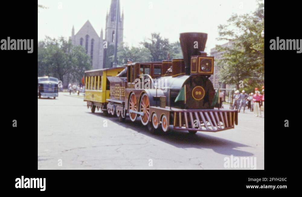1950's: Figural locomotive float, statue of liberty float, girls ...