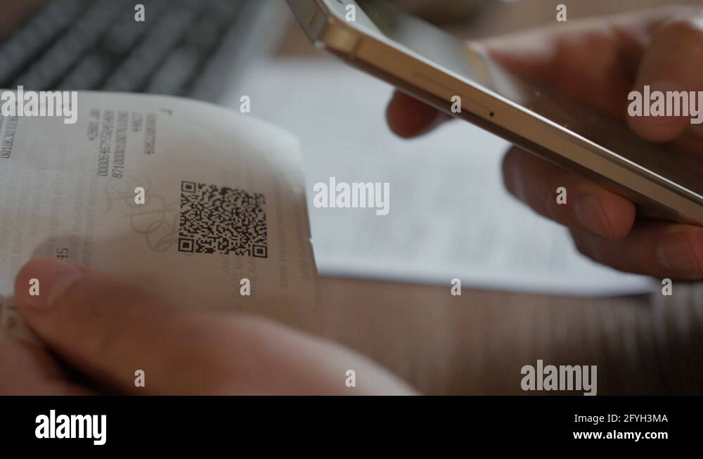 A man scans the QR code on a check from a supermarket Stock Video ...