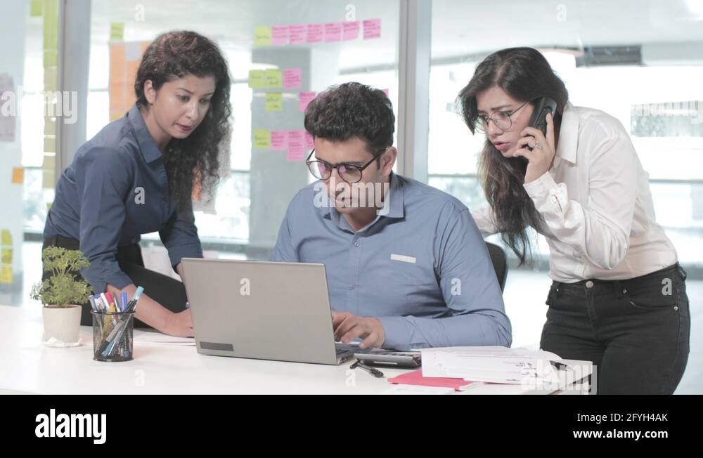 An Indian young office team working in collaboration on an important ...