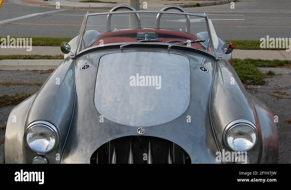 4K Modified Silver MG Convertible Exterior Tilt Up And Zoom Stock Video ...