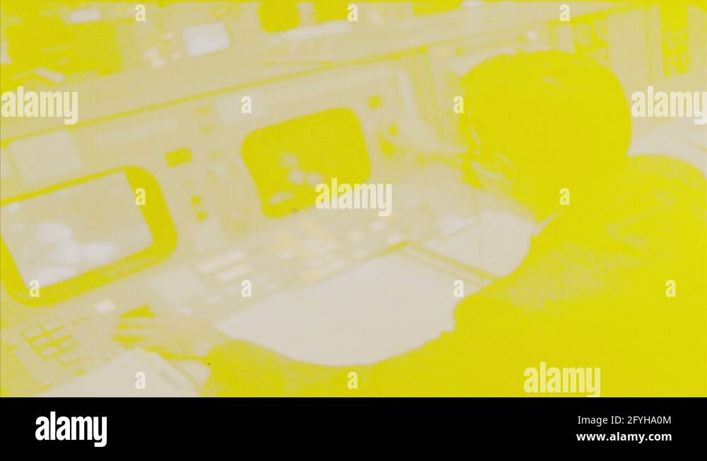 1960s: Control room. Man sits at computer and works Stock Video Footage ...