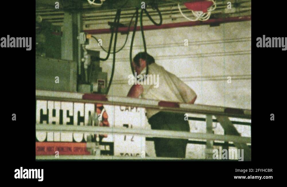 1980s: UNITED STATES: operator works inside nuclear reactor. Spent fuel ...