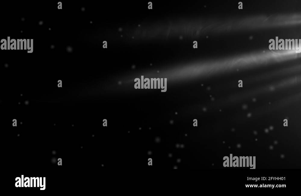 Floating Dust Particles in a Beam of Light Stock Video Footage - Alamy