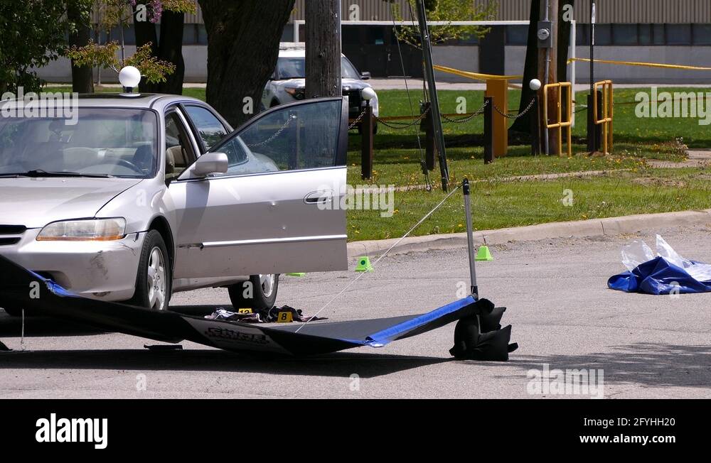 Police homicide officers at shooting murder scene Stock Video Footage ...