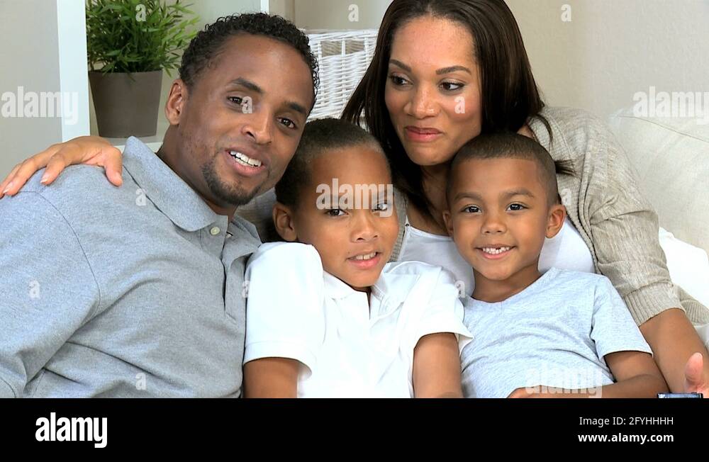 African American Family Watching TV Together Stock Video Footage - Alamy