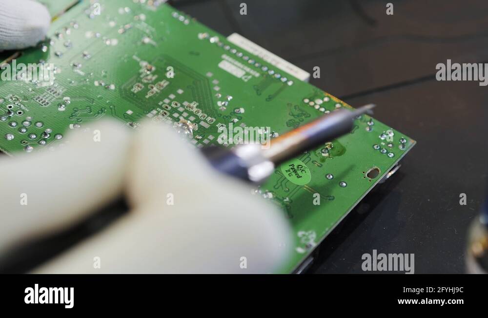 BGA chip soldering on the soldering station. Removal of temperature ...