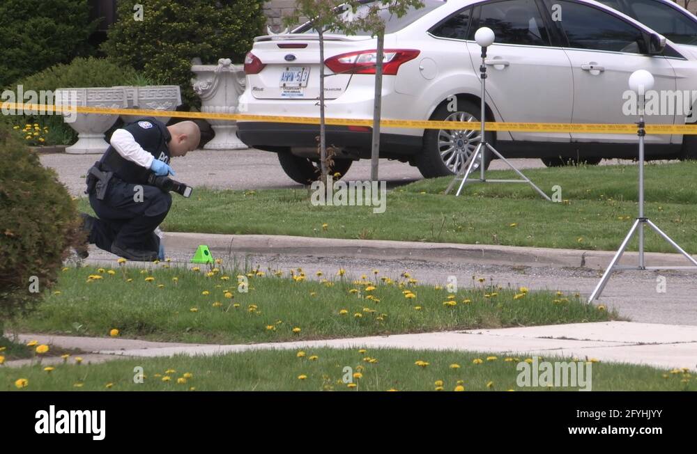 Police homicide officers at shooting murder scene Stock Video Footage ...