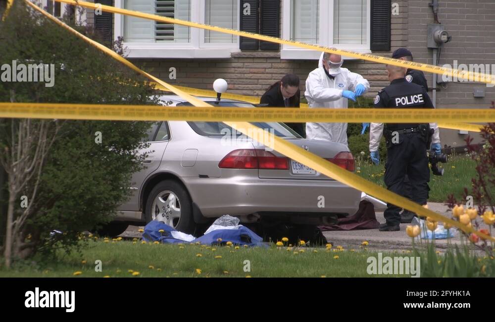 Police homicide officers at shooting murder scene Stock Video Footage ...