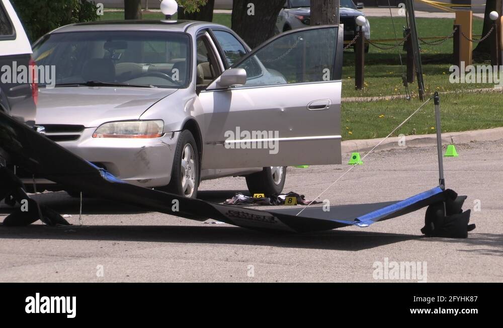 Police homicide officers at shooting murder scene Stock Video Footage ...