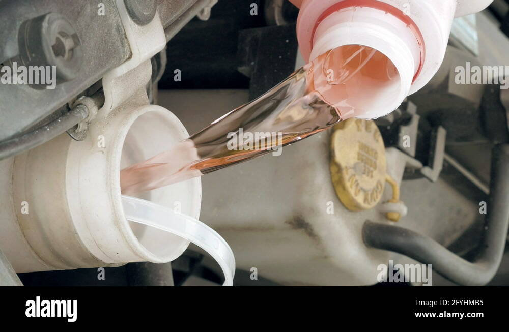 Pouring pink windshield washer fluid into the car Stock Video Footage ...